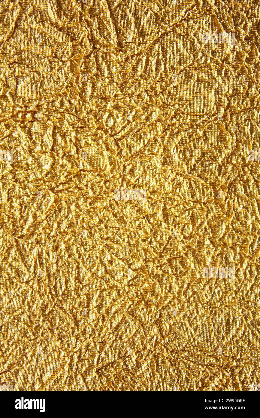 Shiny gold texture crumpled background Stock Photo - Alamy