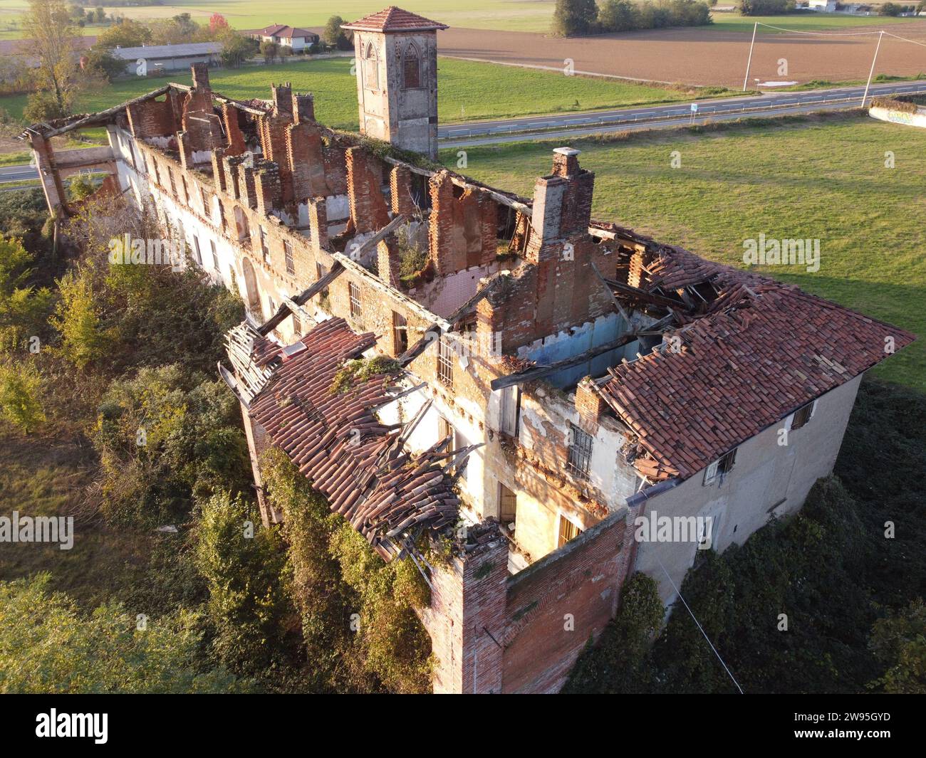 Aerial view of an old wrecked country manor, no people are visible ...
