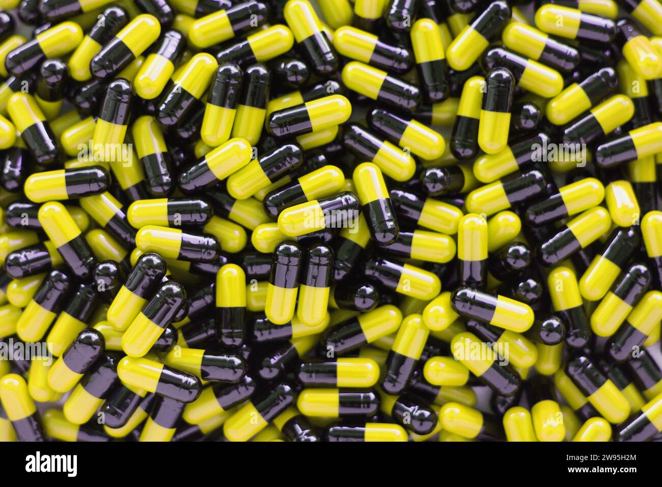 Many medicines pills capsules background Stock Photo - Alamy