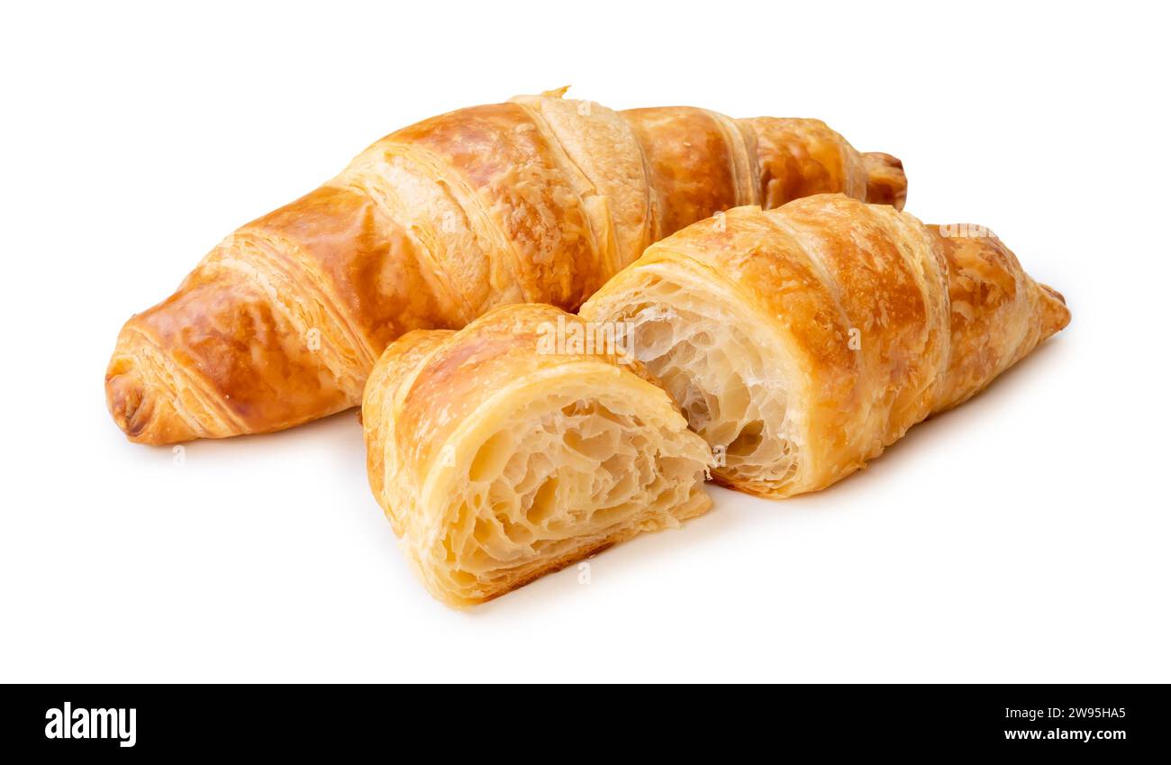 single piece of croissant with two halves is isolated on white ...