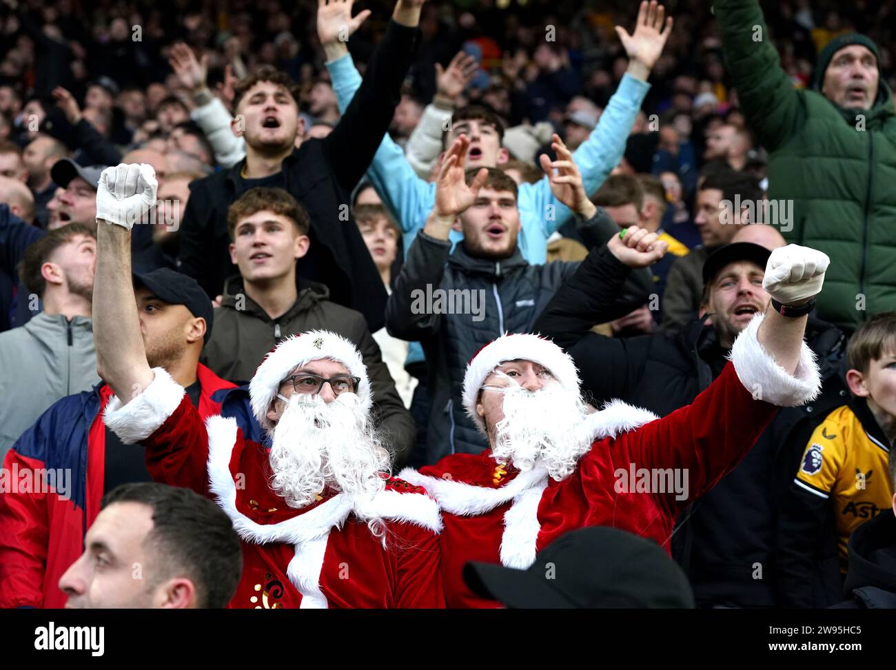 Wolverhampton Wanderers fans dress as Santa Claus celebrate after the ...