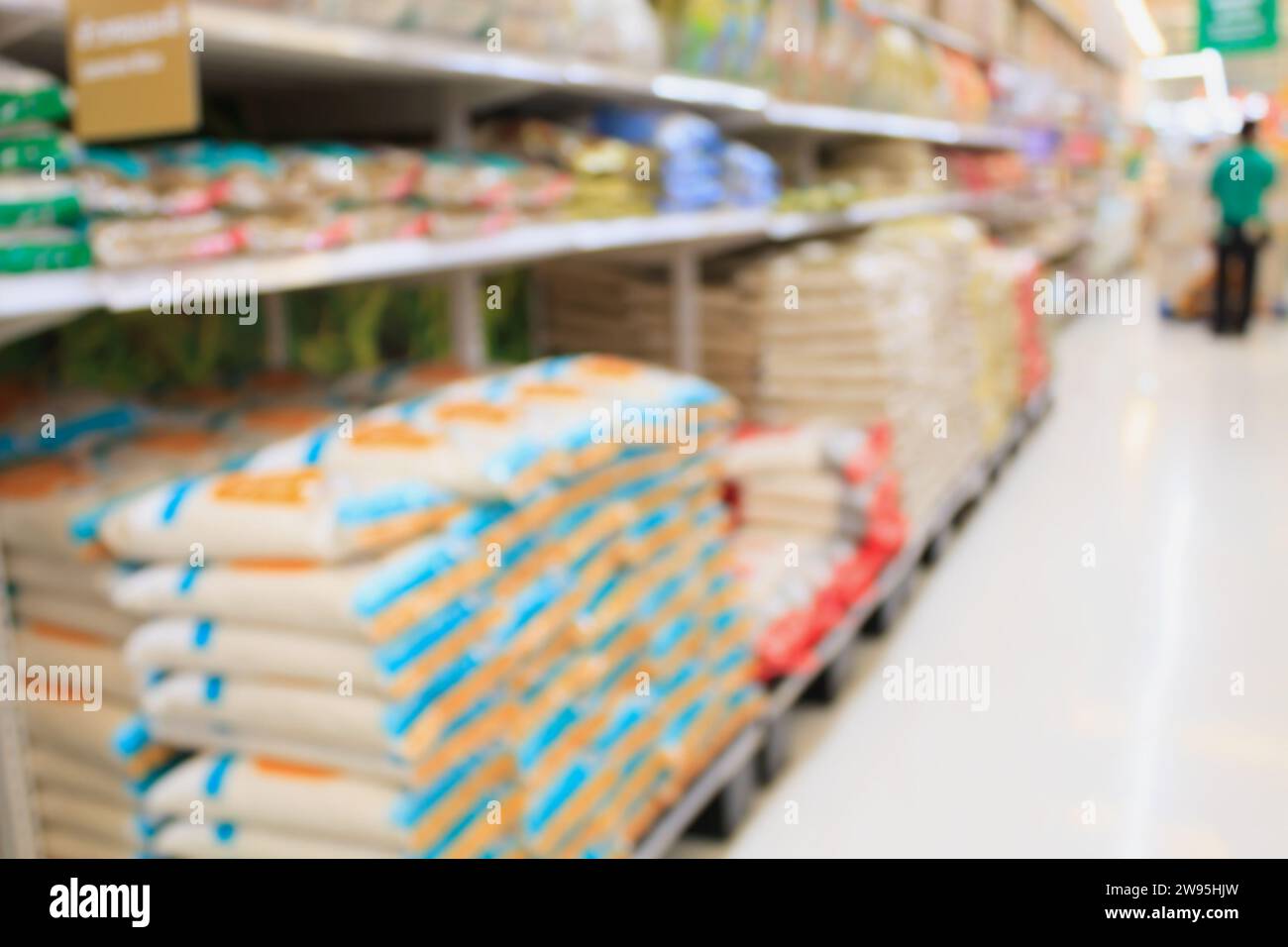 Rice shelves in Supermarket store blurred background Stock Photo - Alamy