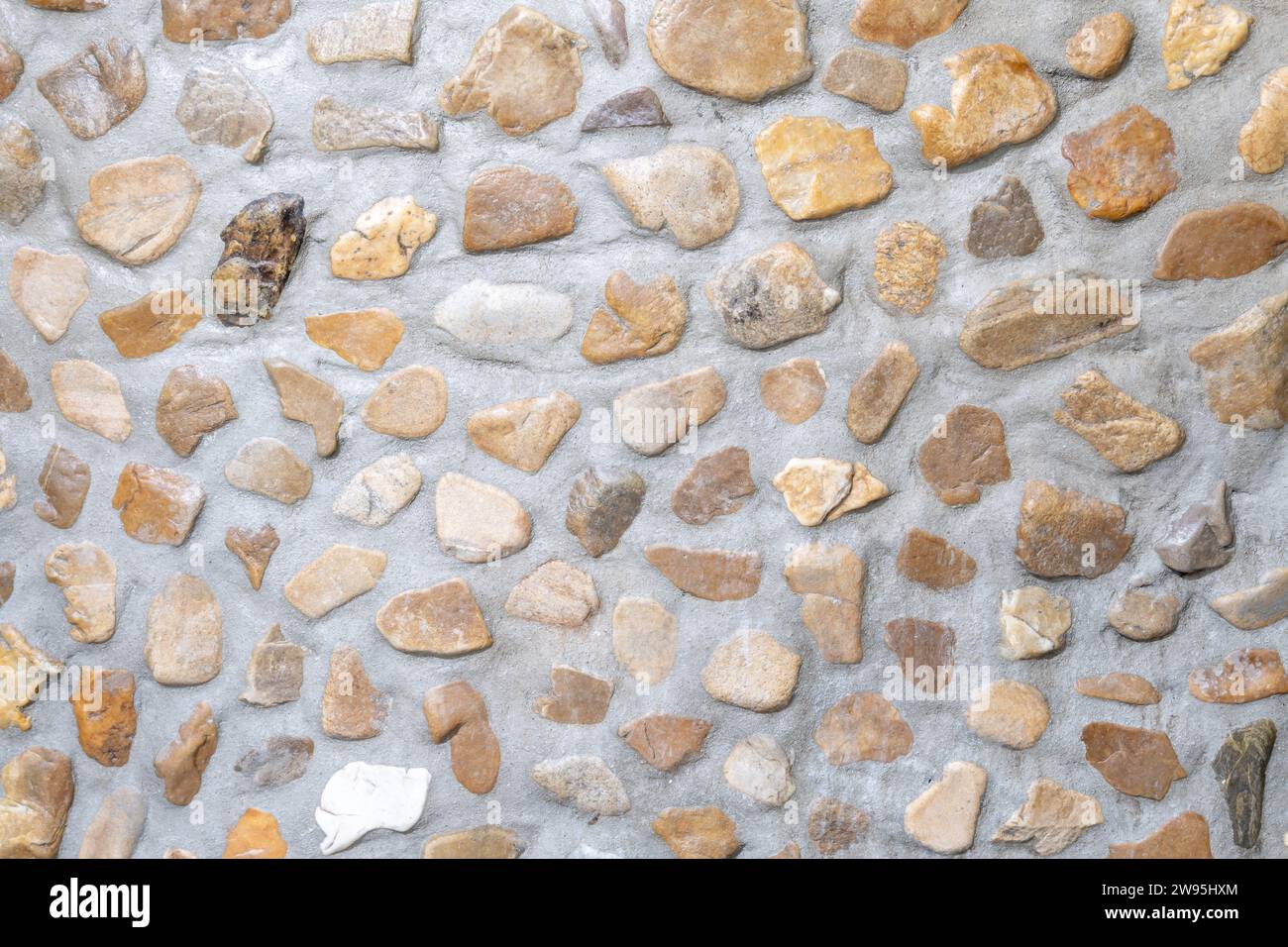 colorful vintage stone wall is used for background texture in ...
