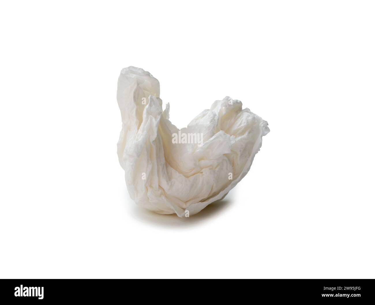 Single white screwed or crumpled tissue paper or napkin in strange ...
