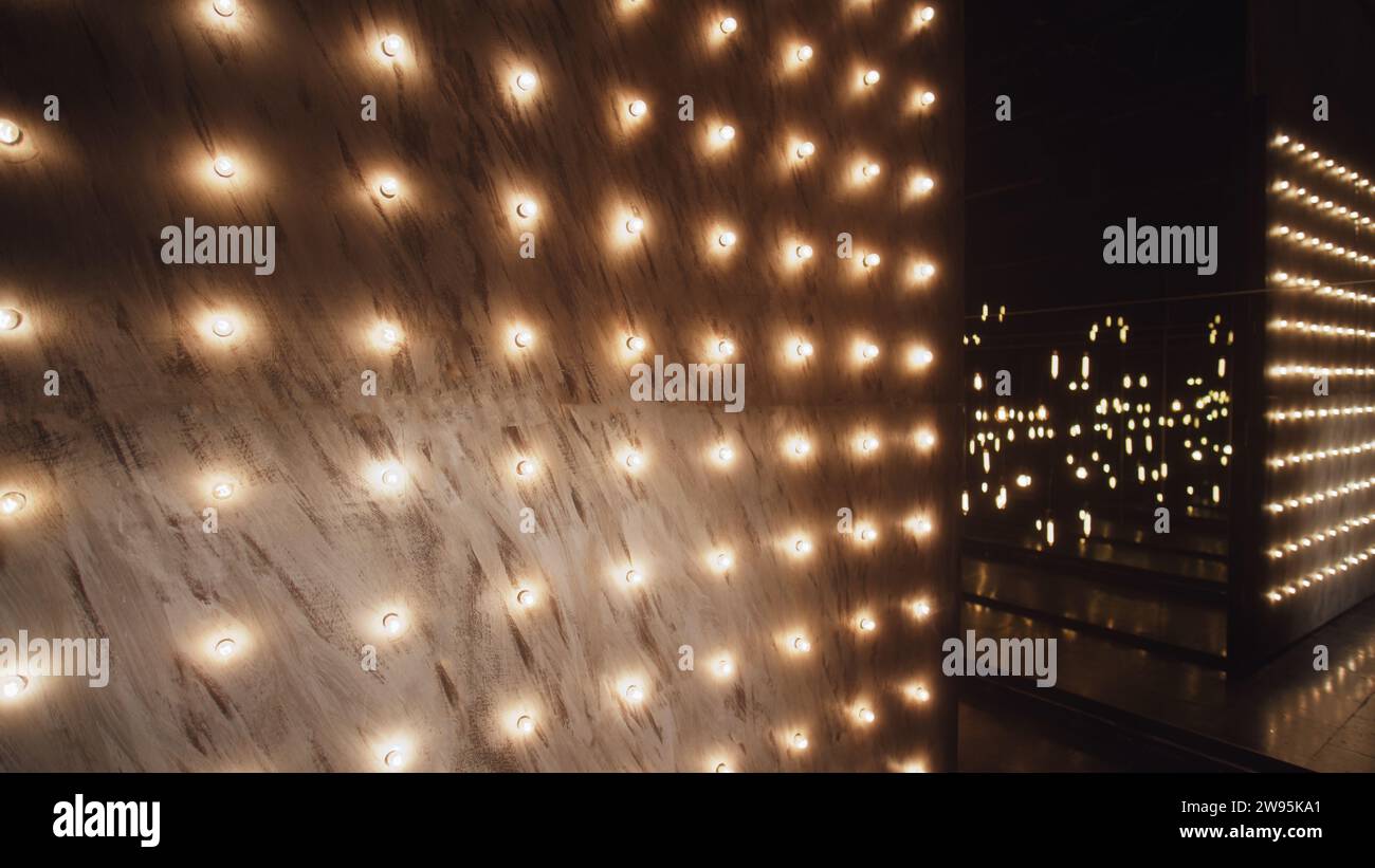 Lights on the wall of a hotel lobby with a floor Stock Photo - Alamy