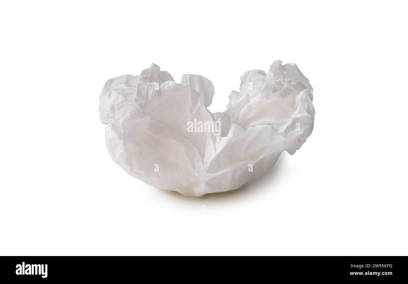 Single screwed or crumpled tissue paper or napkin in strange shape ...