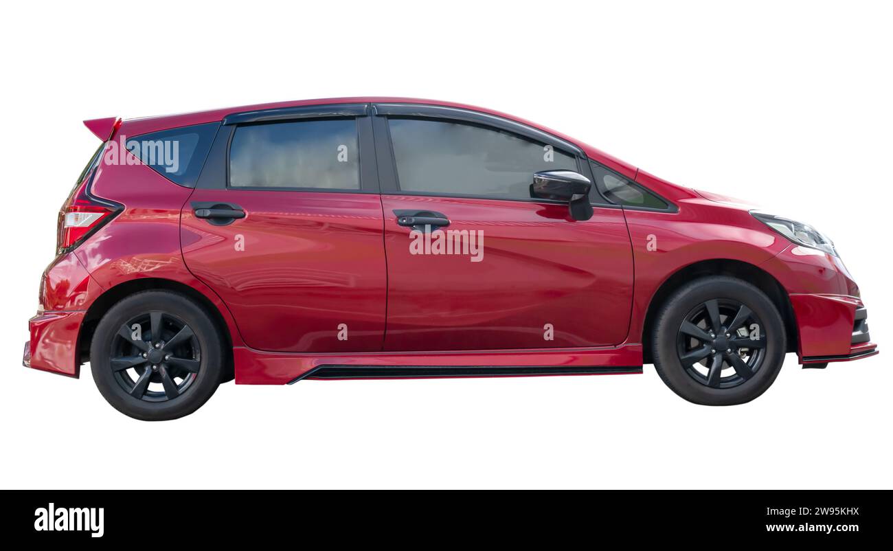 Single lovely small red hatchback car is isolated on white background ...