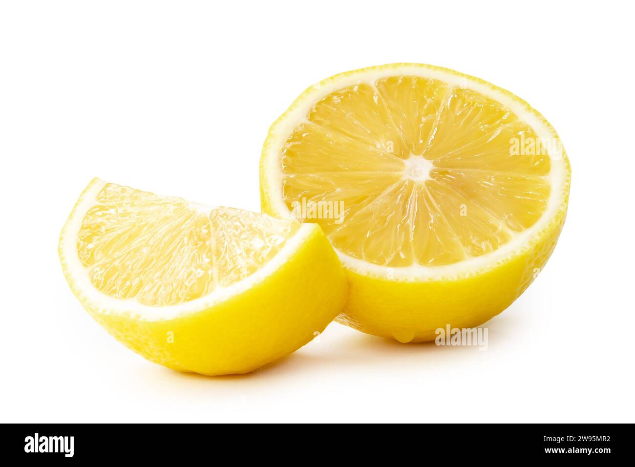 Beautiful yellow lemon half with slice is isolated on white background ...