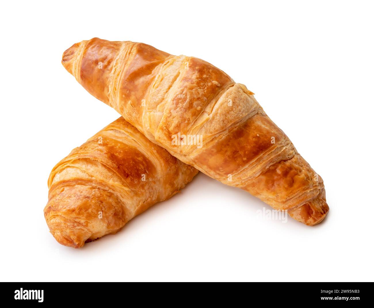 two piece of croissant in stack are isolated on white background with ...