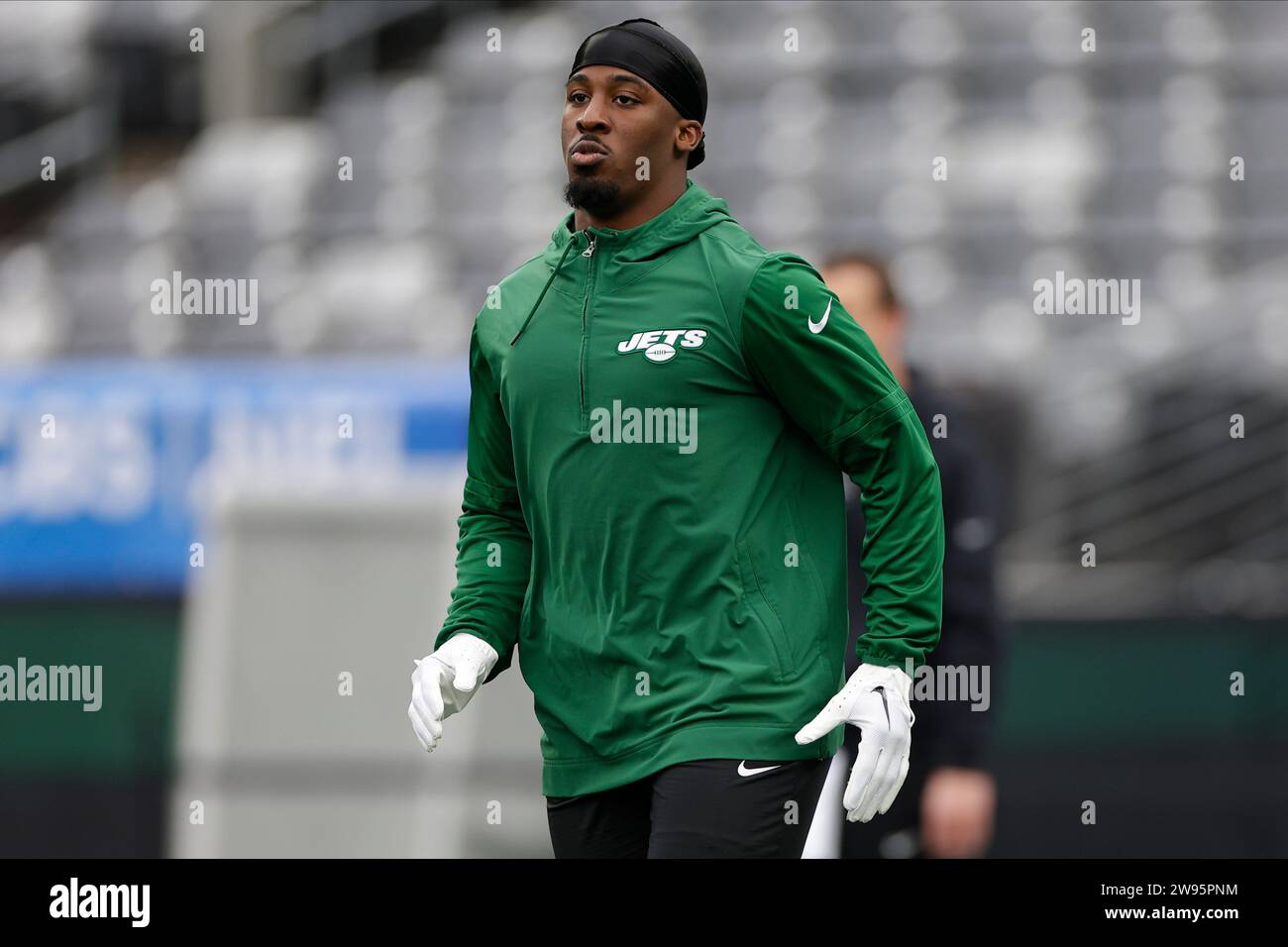New York Jets running back Breece Hall warms up before playing against ...