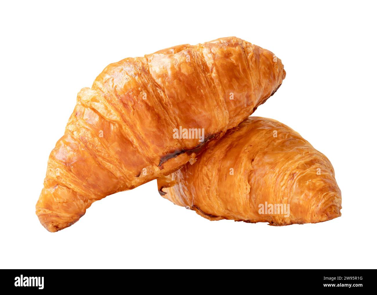 two piece of croissant in stack and cross shape are isolated on white ...
