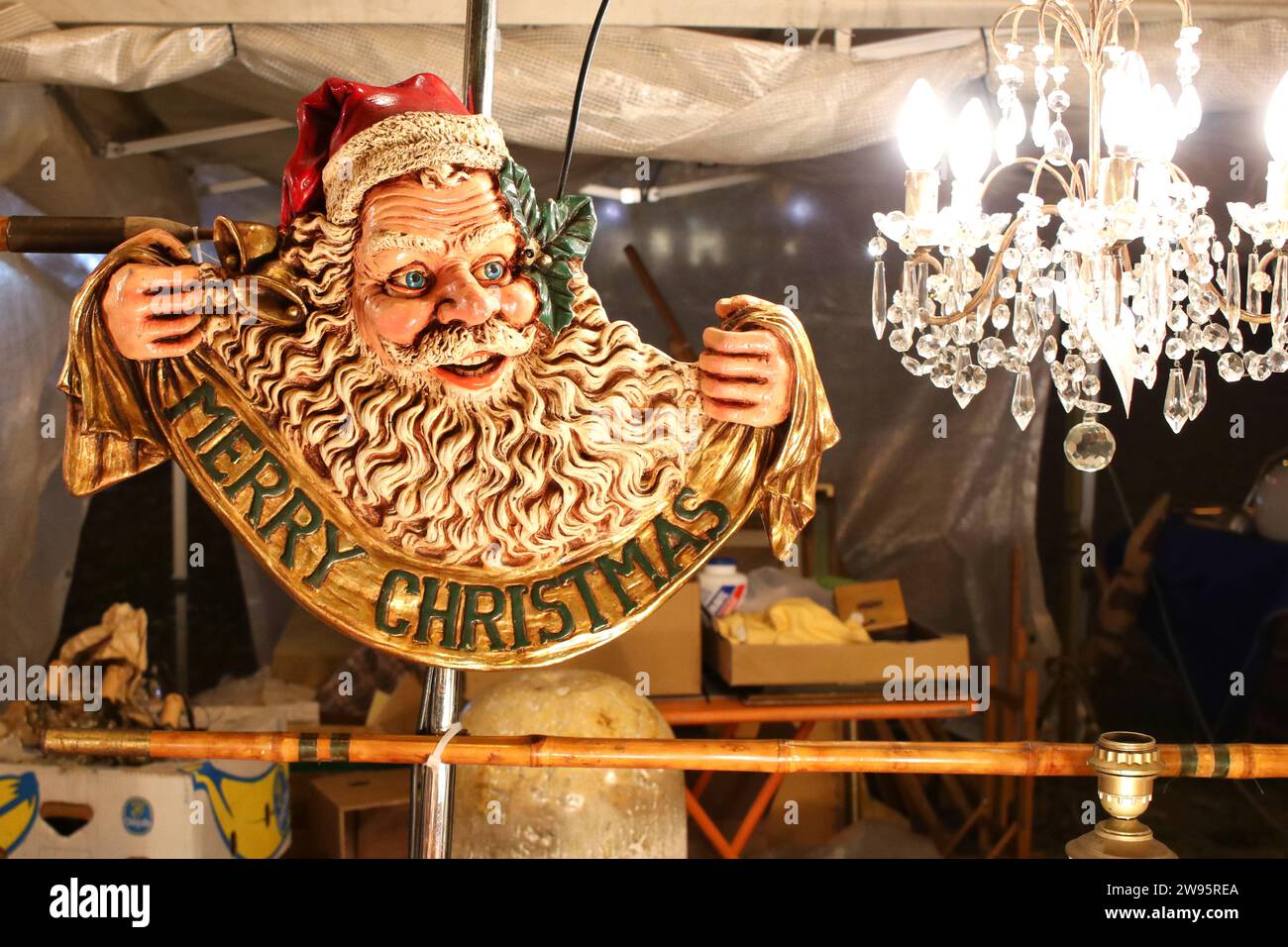 Bas-relief carved in wood with the image of Santa Claus and the words ...