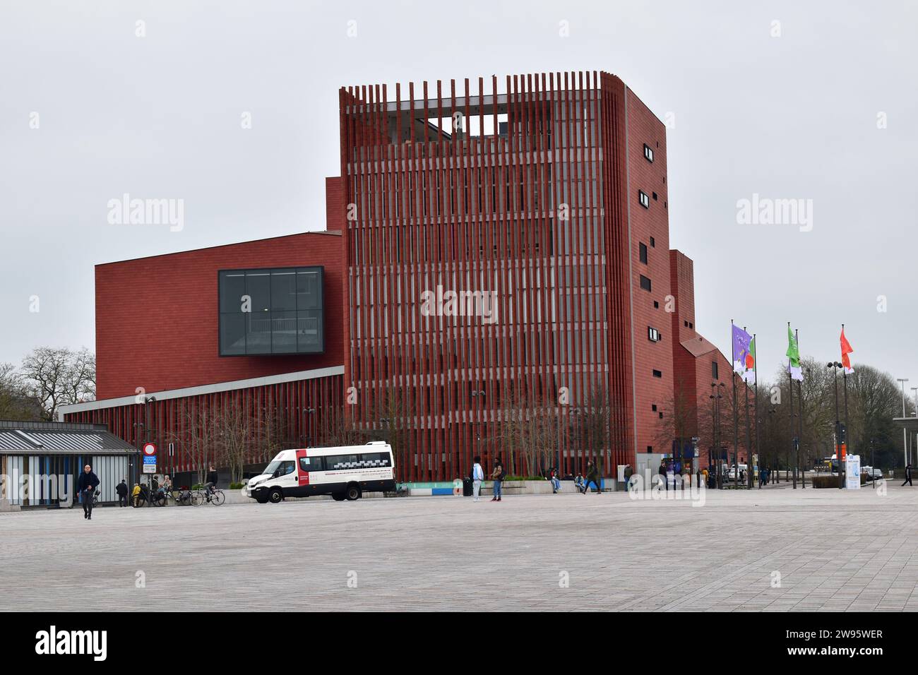 The modern red brick opera house of Bruges as seen from Het Zand square ...