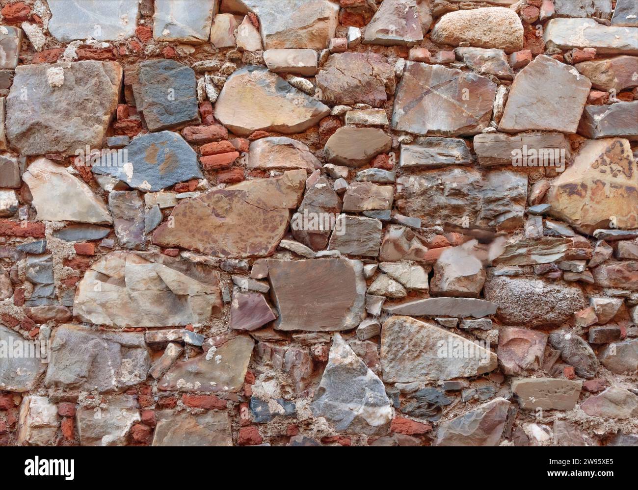 Cool background of a brick wall with dark blue stones hi-res stock ...