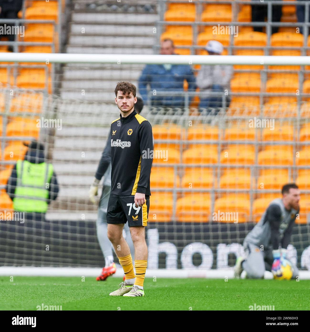 Wolverhampton, UK. 24th Dec, 2023. Wolves' Owen Hesketh warms up ahead ...