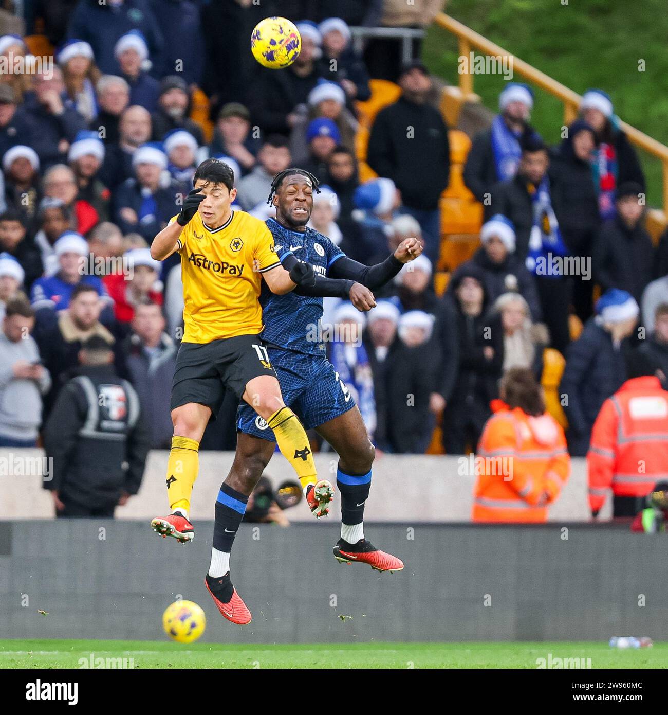 Wolverhampton, UK. 24th Dec, 2023. Wolves' Hwang Hee-Chan & Chelsea's ...