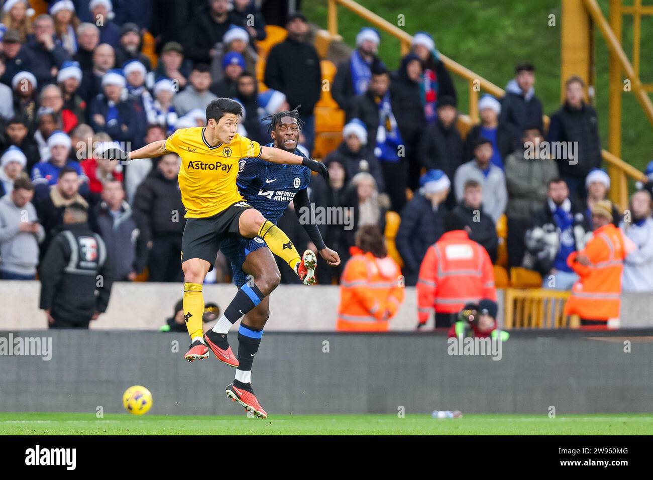 Wolverhampton, UK. 24th Dec, 2023. Wolves' Hwang Hee-Chan & Chelsea's ...