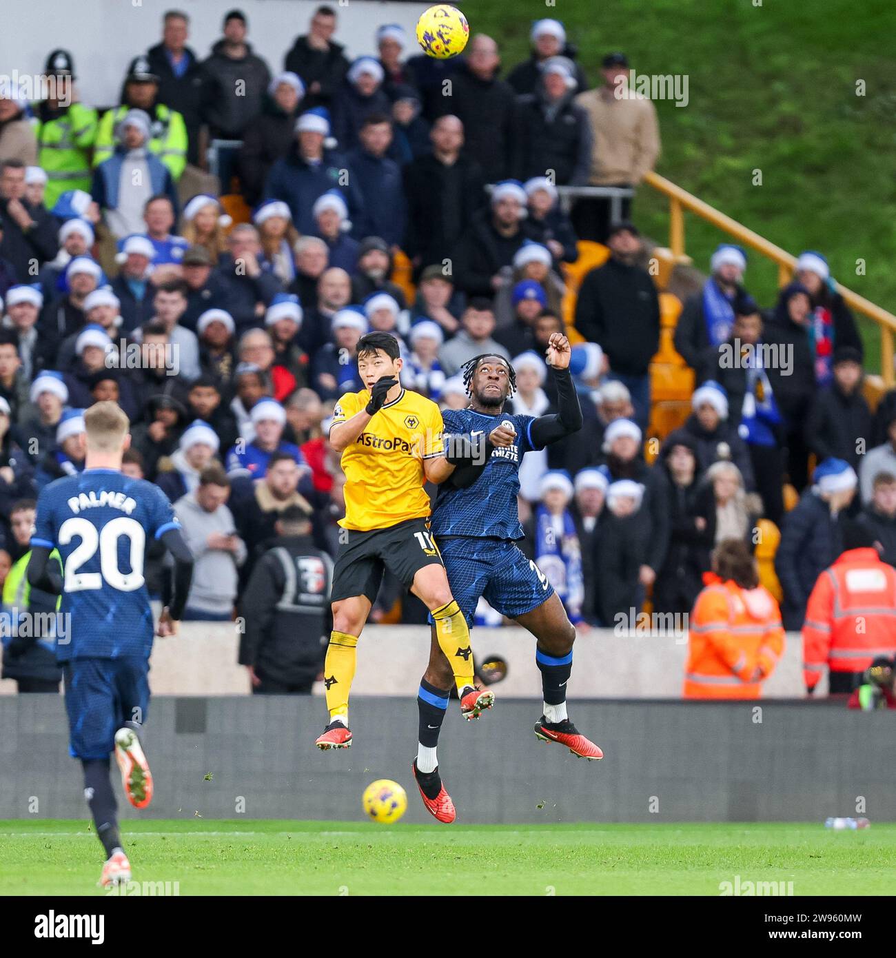 Wolverhampton, UK. 24th Dec, 2023. Wolves' Hwang Hee-Chan & Chelsea's ...