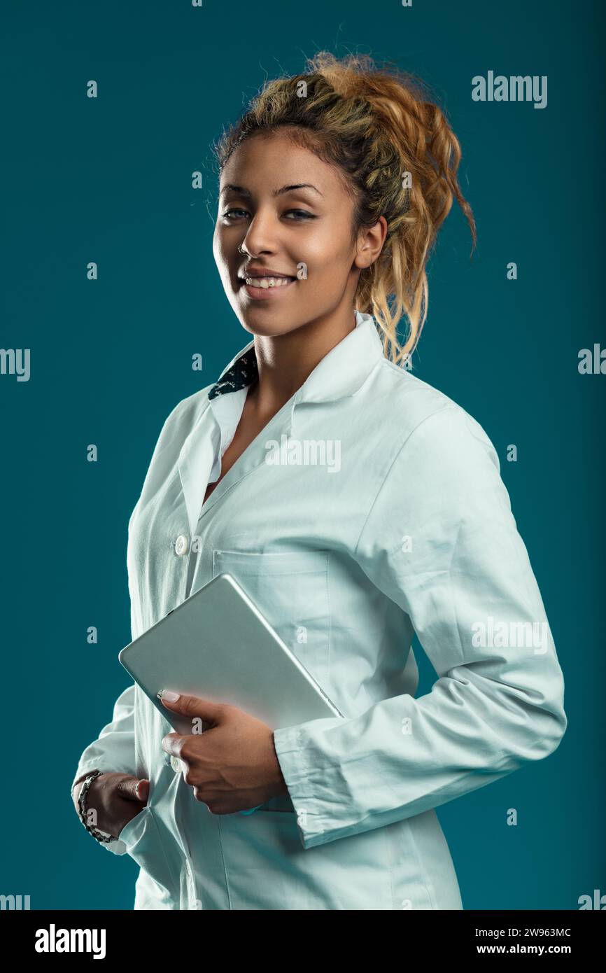 Lab coat and tablet signal new vision in knowledge application Stock ...