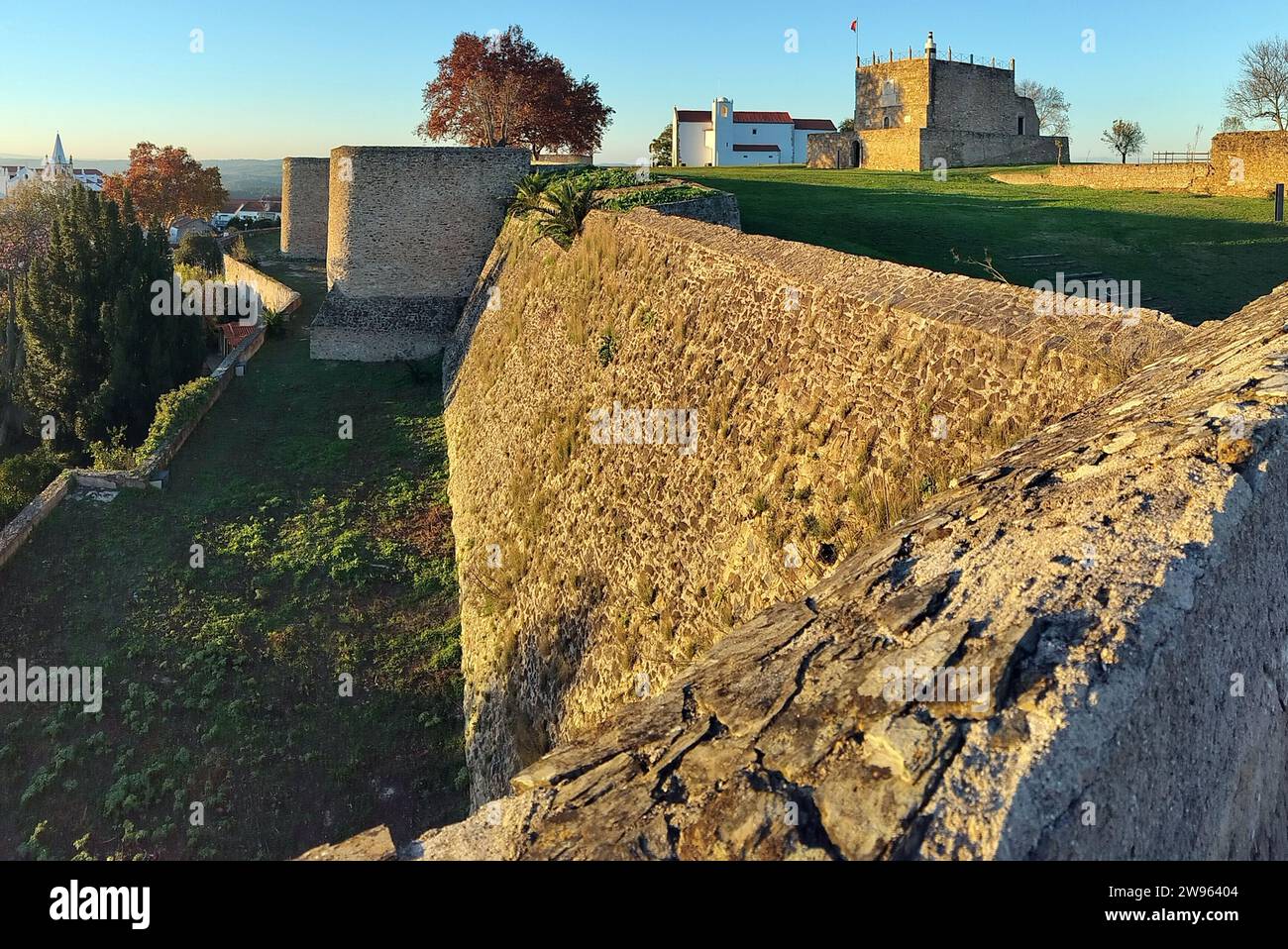 Bastions and ramparts of the Castle of Abrantes, view in sunset light ...