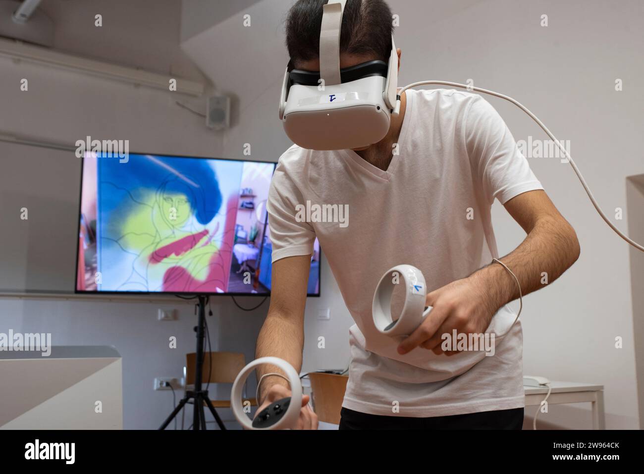 Boy having fun using VR virtual reality equipment Stock Photo - Alamy