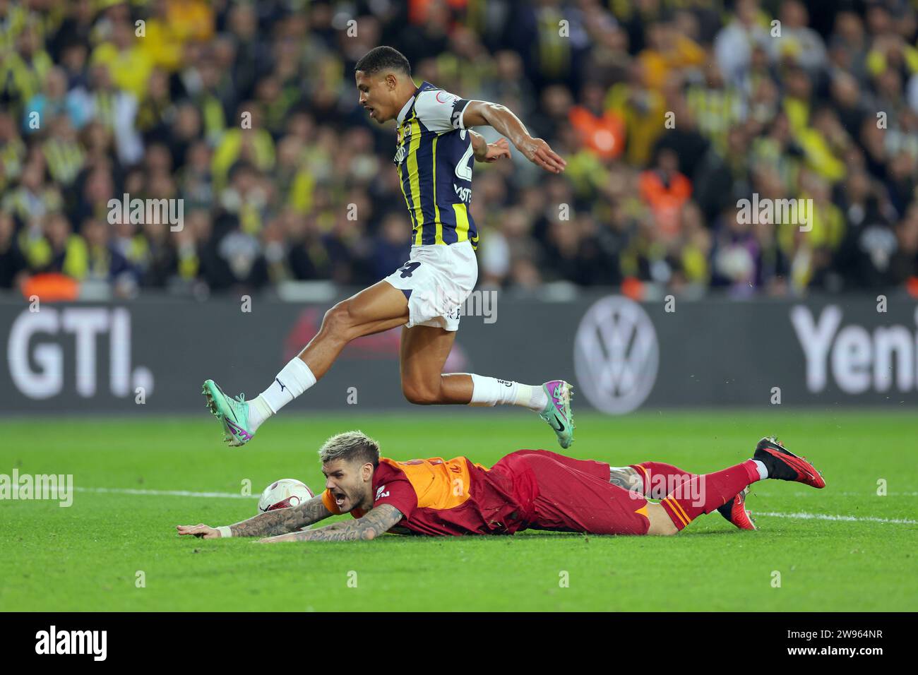 Fenerbahce's Jayden Oosterwolde jumps over Galatasaray's Mauro Icardi ...