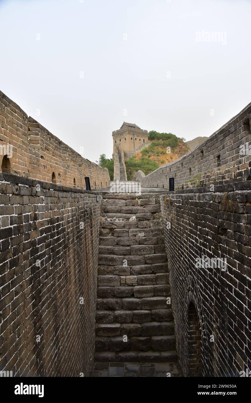 Stone staircase running along the topside of the Great Wall of China at ...