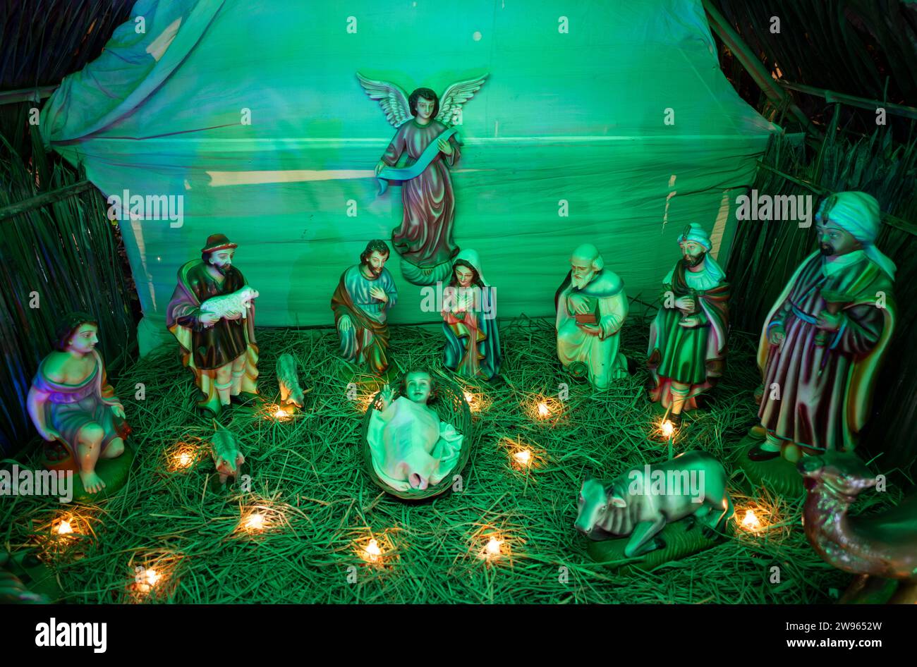 An illuminated nativity depicting the birth the baby Jesus, on the eve ...