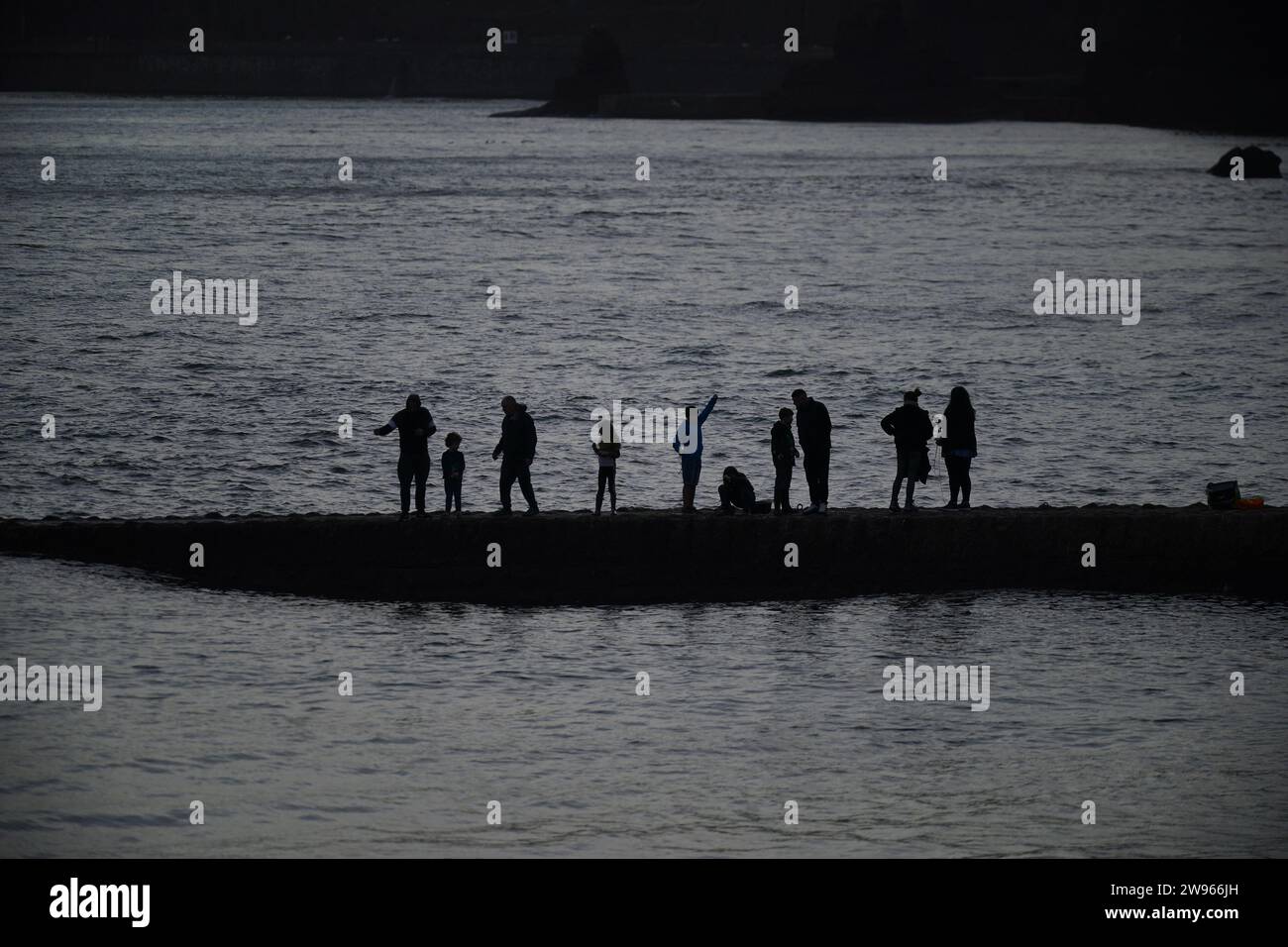 People crabbing on the beach in Dawlish Warren, south Devon. Picture ...
