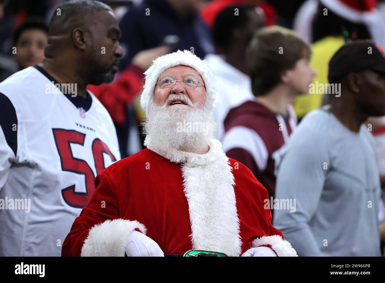 Houston, Texas, USA. 24th Dec, 2023. A fan dressed as Santa Claus ...