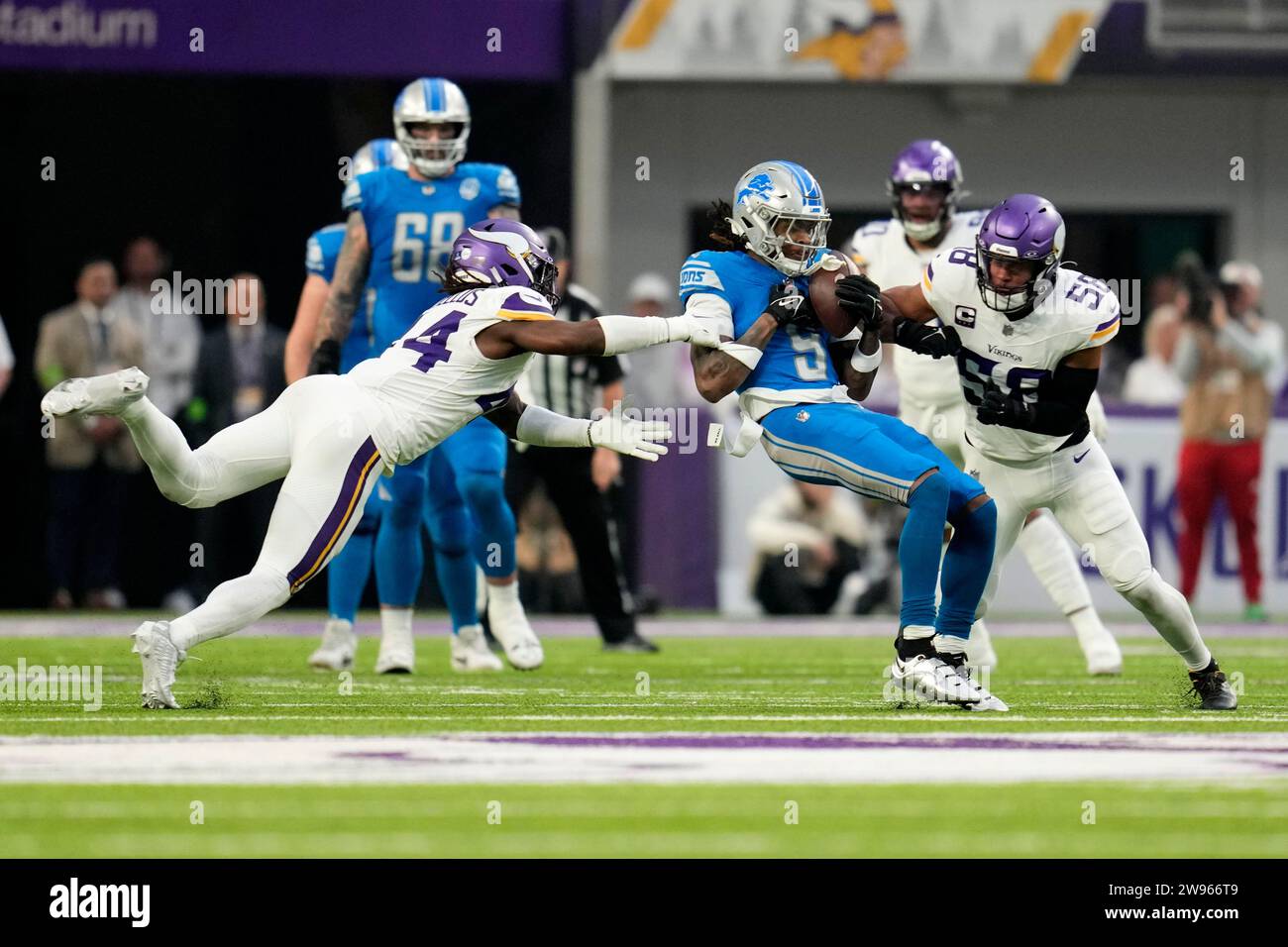Detroit Lions wide receiver Jameson Williams (9) is tackled by ...