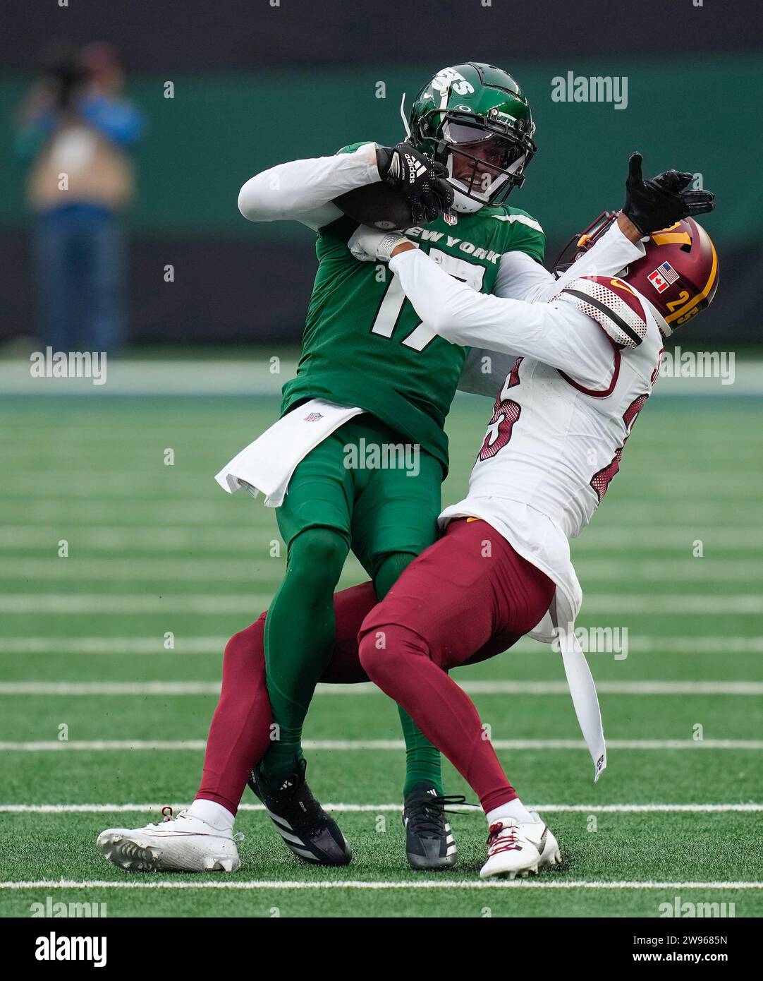 New York Jets wide receiver Garrett Wilson (17) is tackled by ...