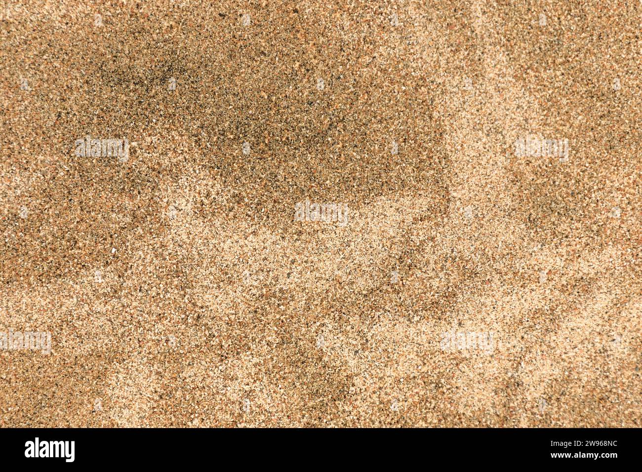 Background of flat damp sand on a river bed Stock Photo - Alamy