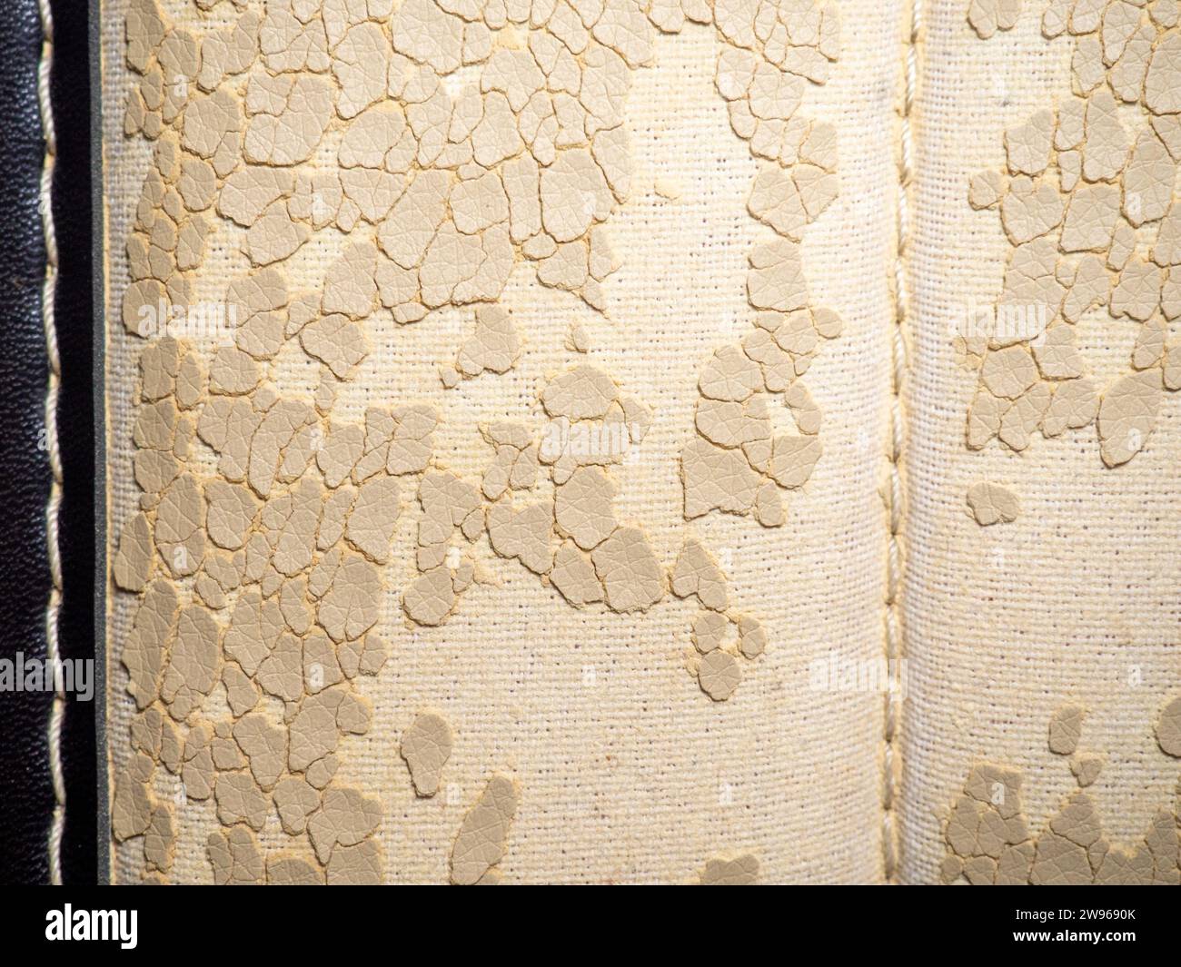 Background made of peeled faux leather. Seams on the material. Old ...