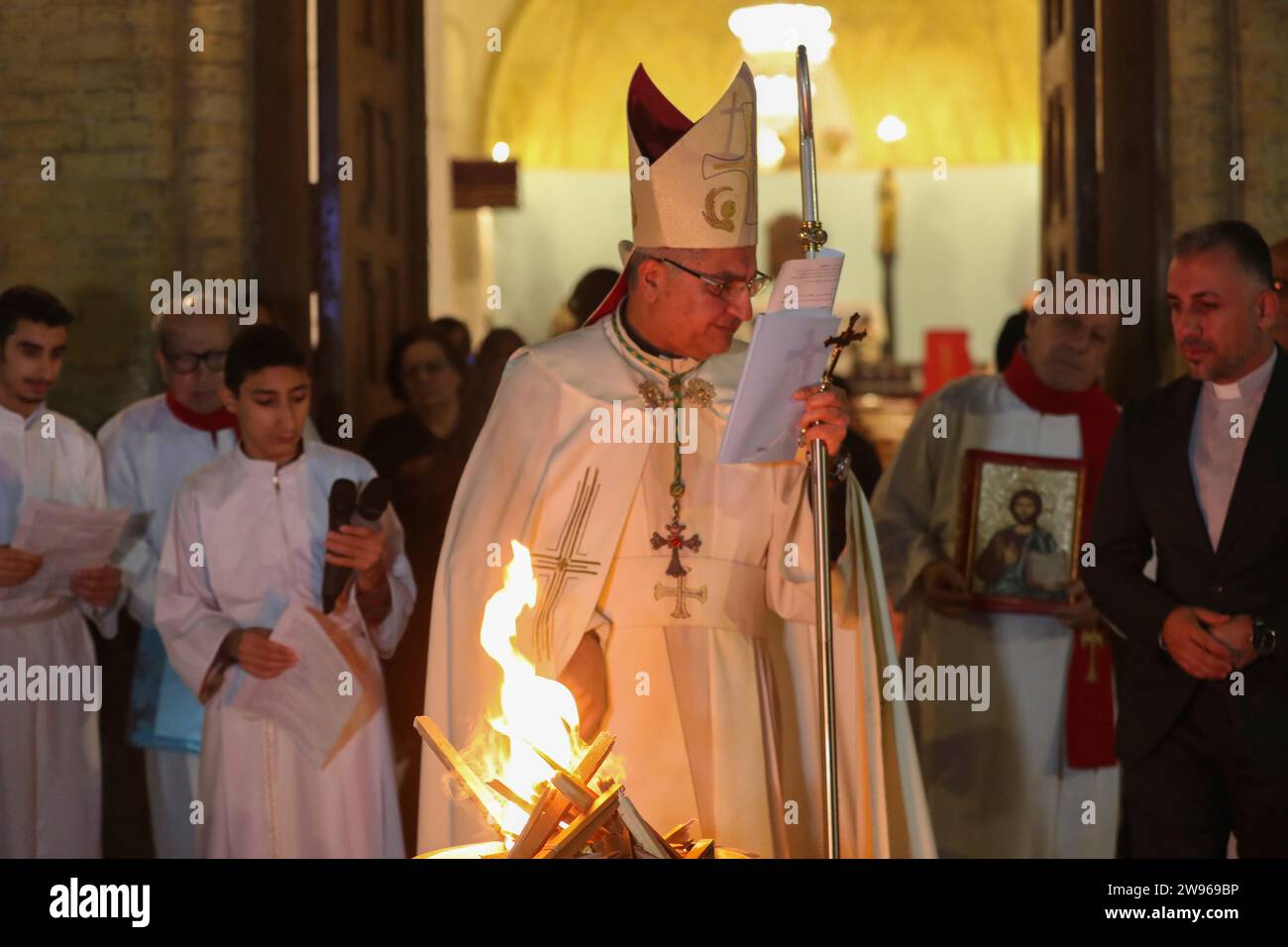 Iraqi Christians attend a Christmas mass at the Mother Teresa Catholic ...
