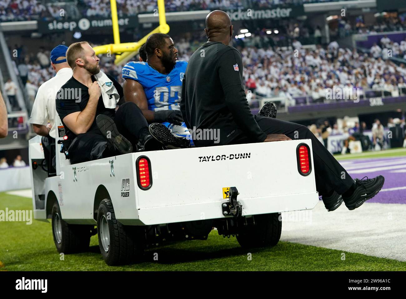 Detroit Lions defensive end Josh Paschal (93) is carted off the field ...