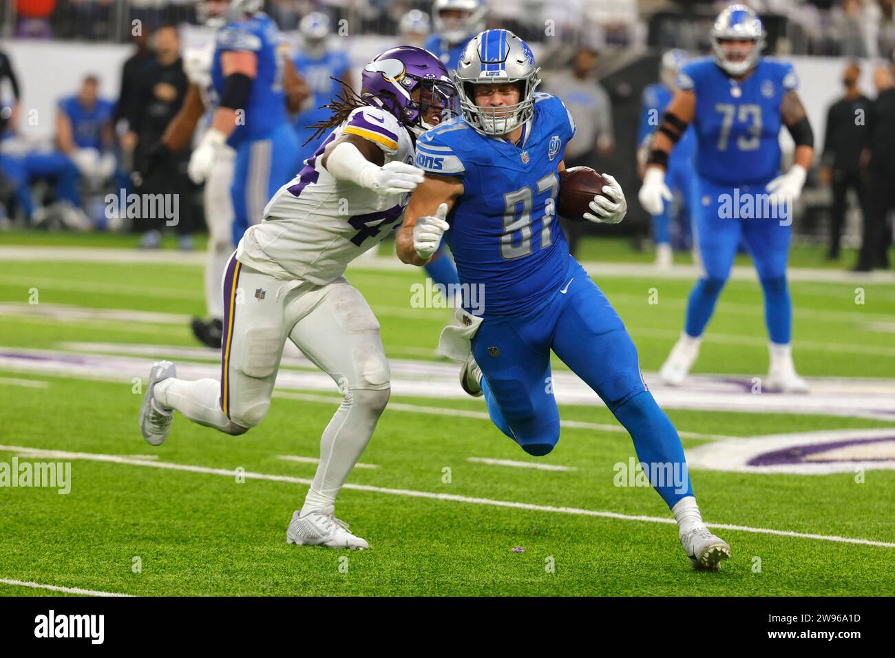 Detroit Lions tight end Sam LaPorta (87) runs from Minnesota Vikings ...