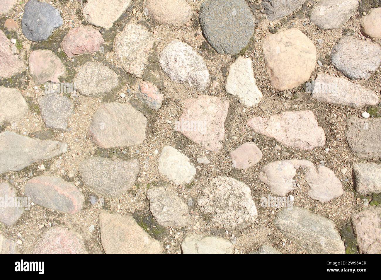Stone background of cobblestones. An old paved stone road. Brutal ...