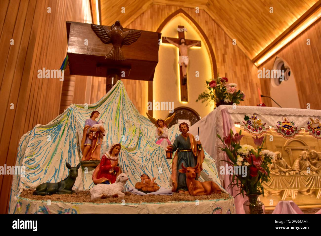 A view of decorated nativity scene inside the Holy Family Catholic ...