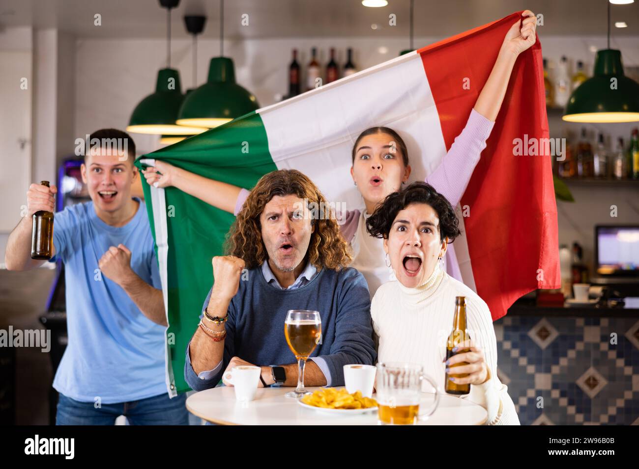 Joyful fans of the Italian team celebrating the victory in the night ...