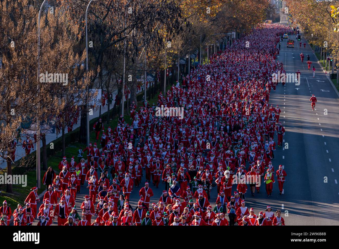 Madrid, Spain. 24th Dec, 2023. Thousands of people dressed as Santa ...