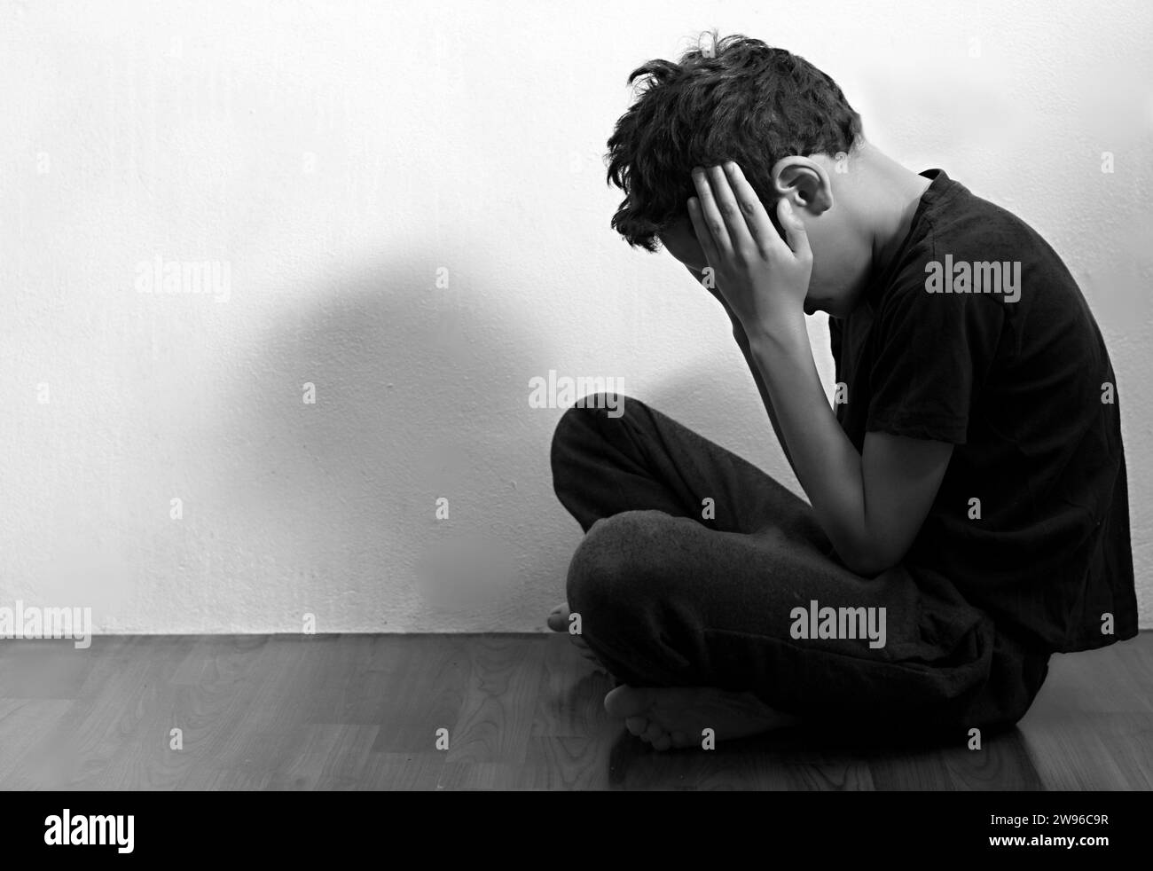 boy praying in poverty on the floor stock image with no help crying ...