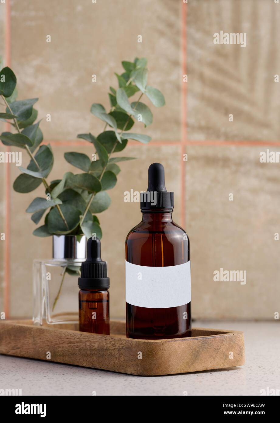 Brown glass bottle with white label and pipette, container for ...