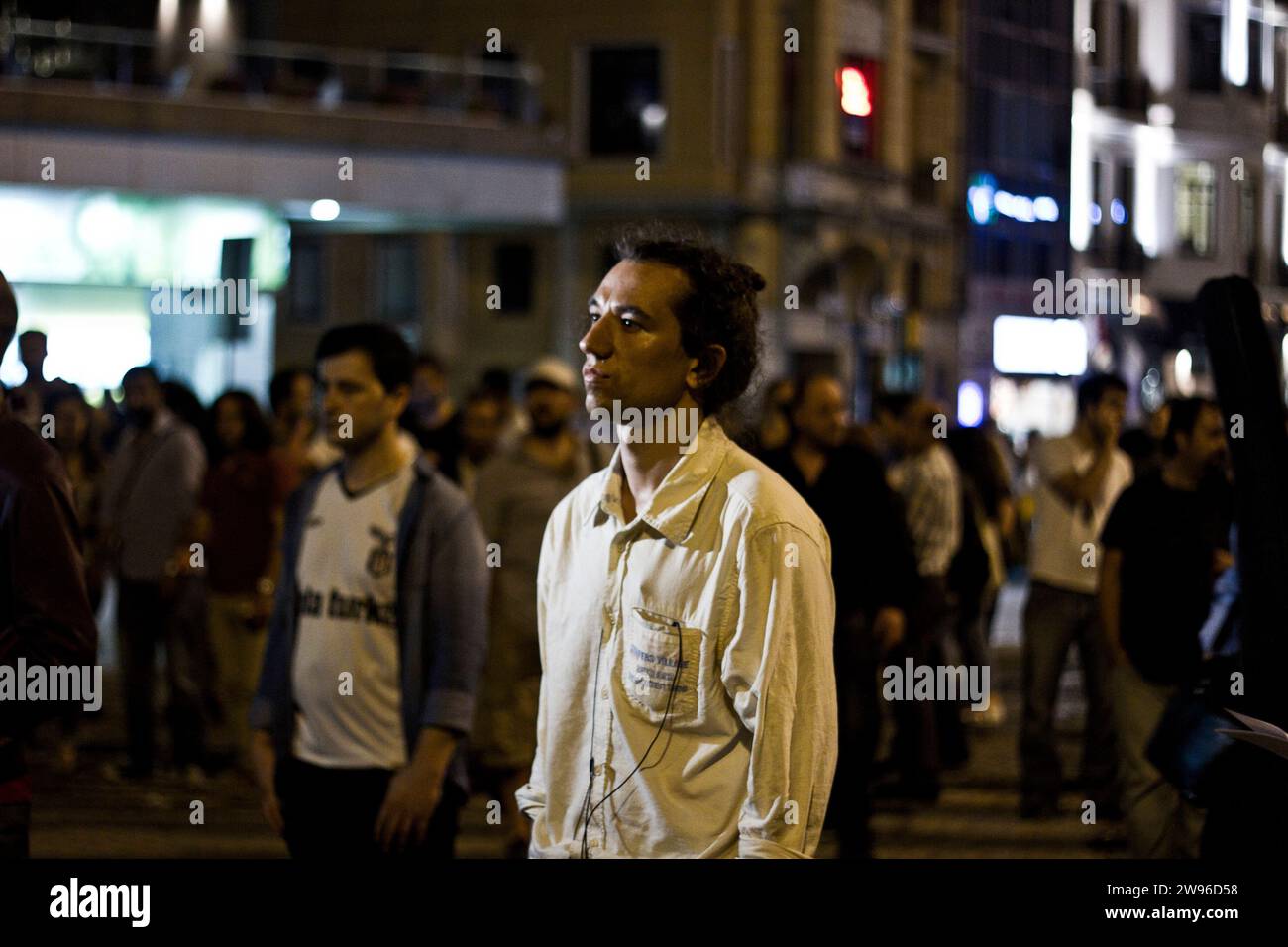 One man later identified as performance artist Erdem Gunduz, started ...