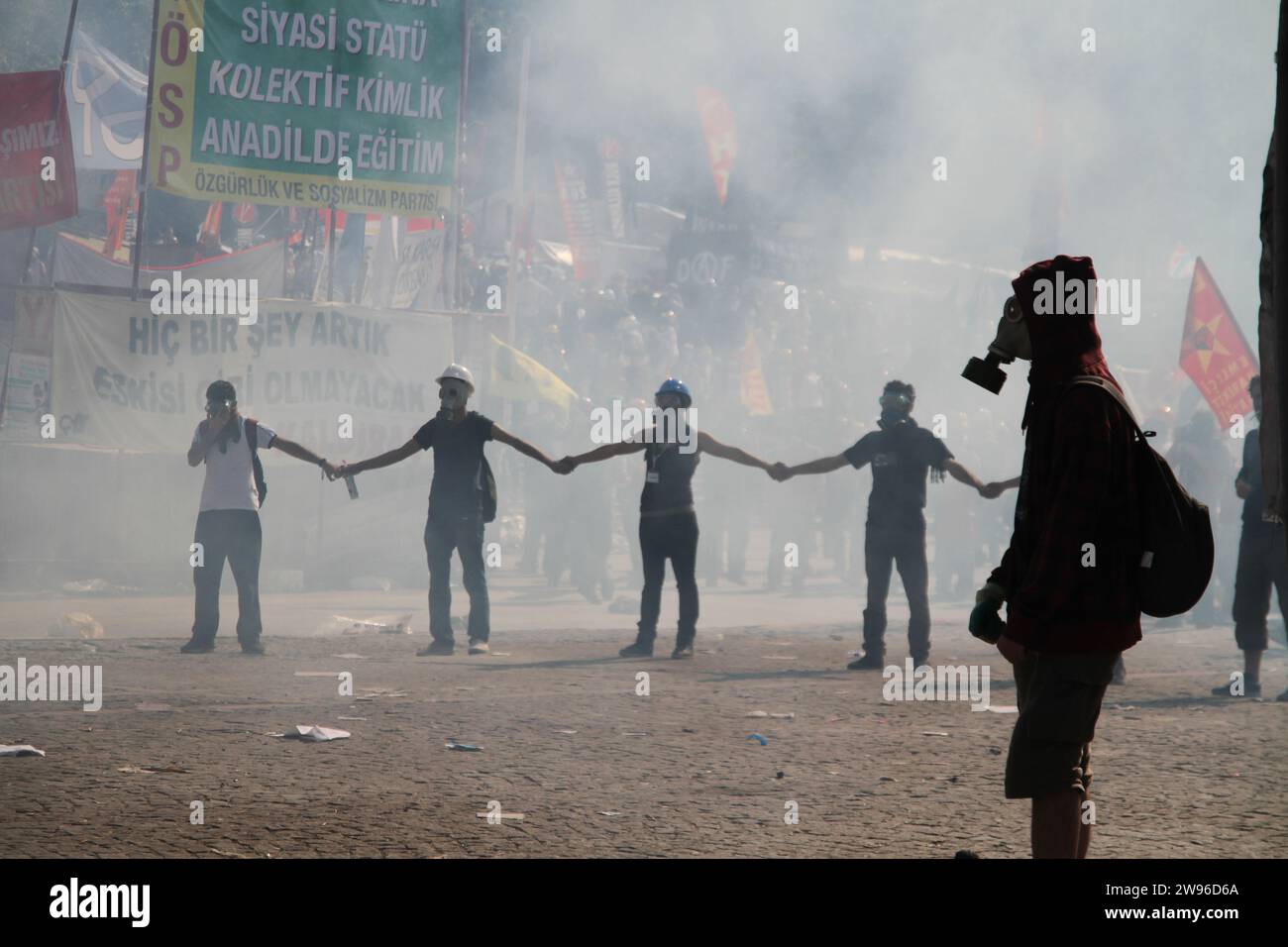 Gezi Protests against the AKP government. Protestors hold hands to ...