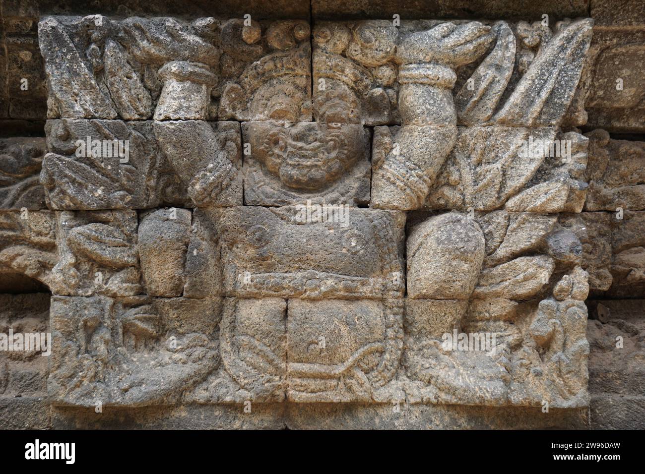 Relief on the wall of Tegowangi temple in Kediri, East Java. This ...