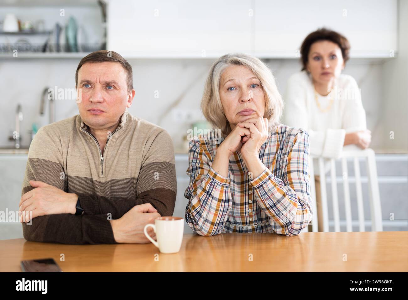 Family quarrel, all family members are upset, disappointed, keeping ...