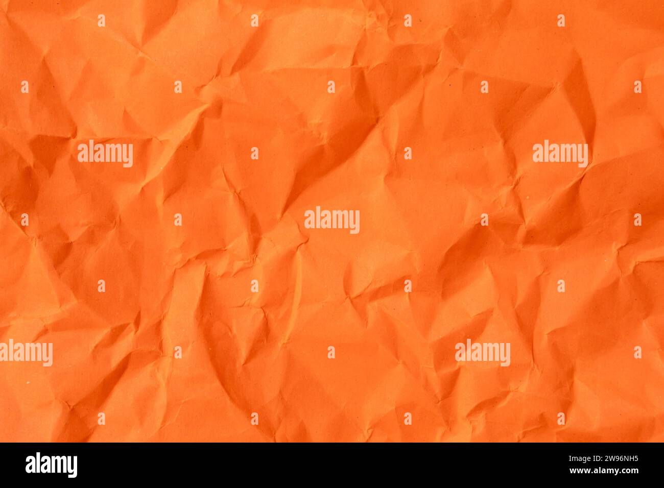Orange crumpled paper texture is used for paper background texture in ...