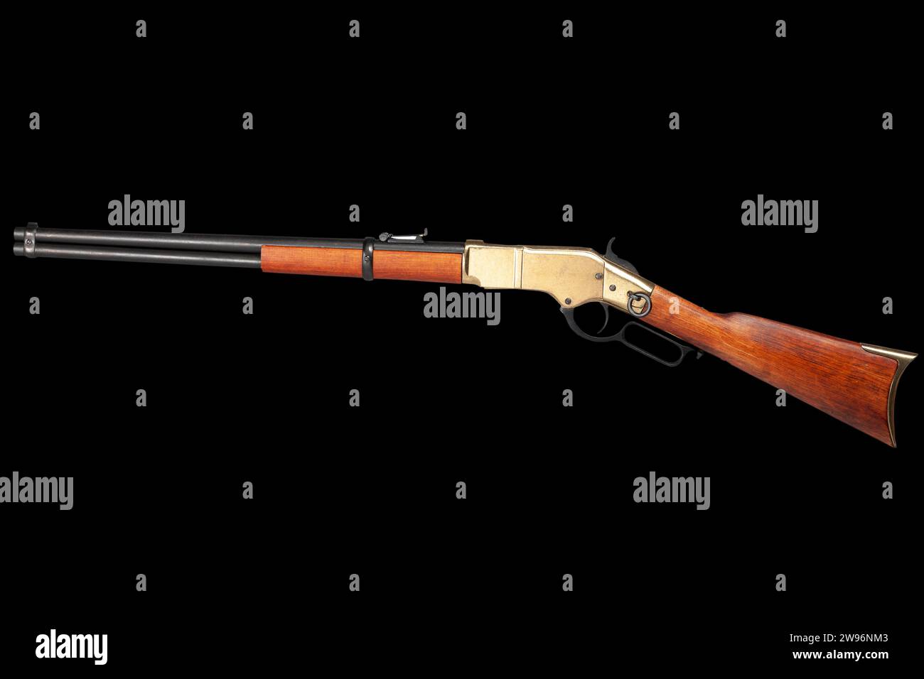 Old west Winchester lever-action repeating rifle on black background ...