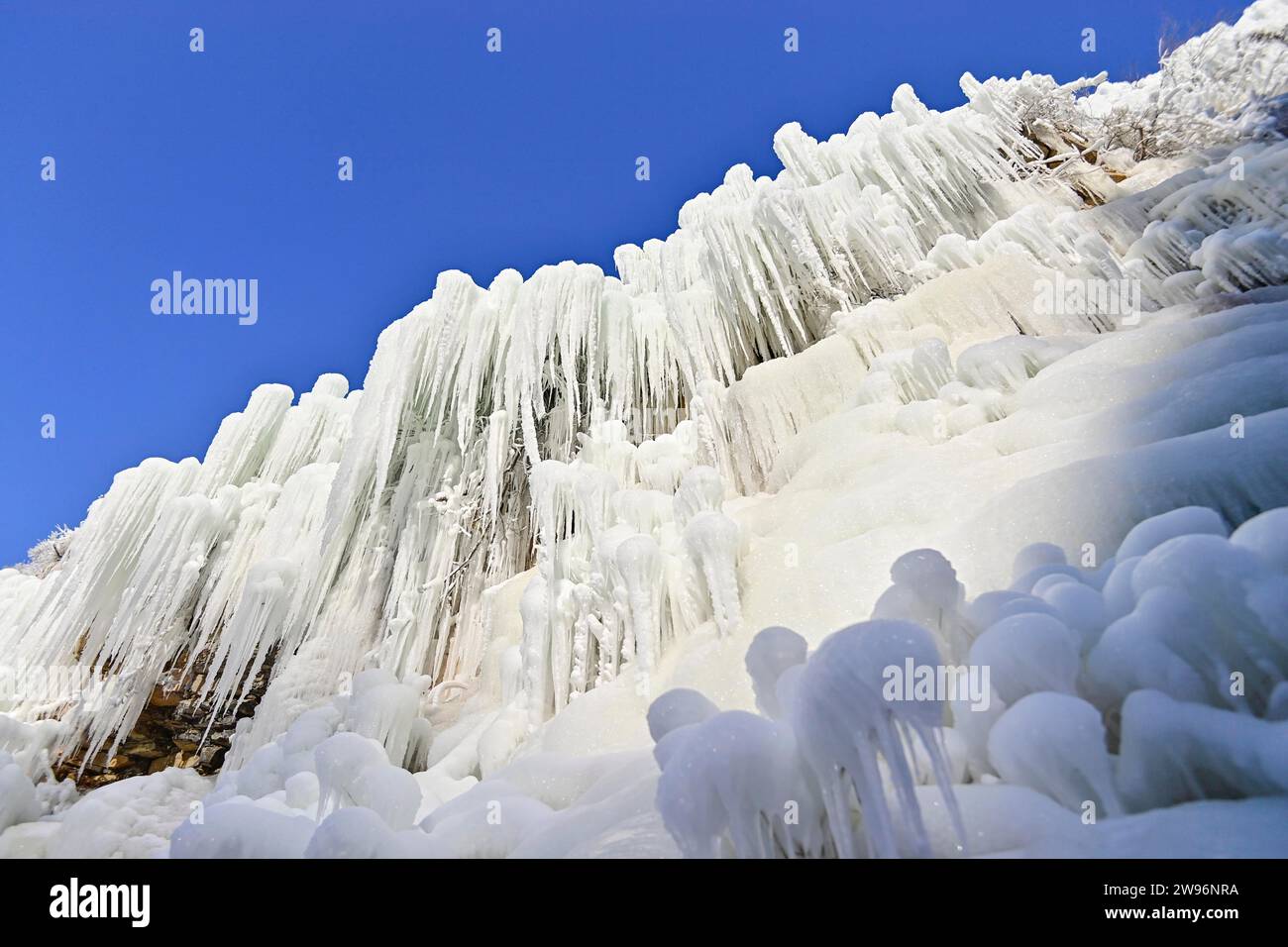 Qingzhou, China. 24th Dec, 2023. An icefall landscape is being showcased at the Tianci Mountain ...